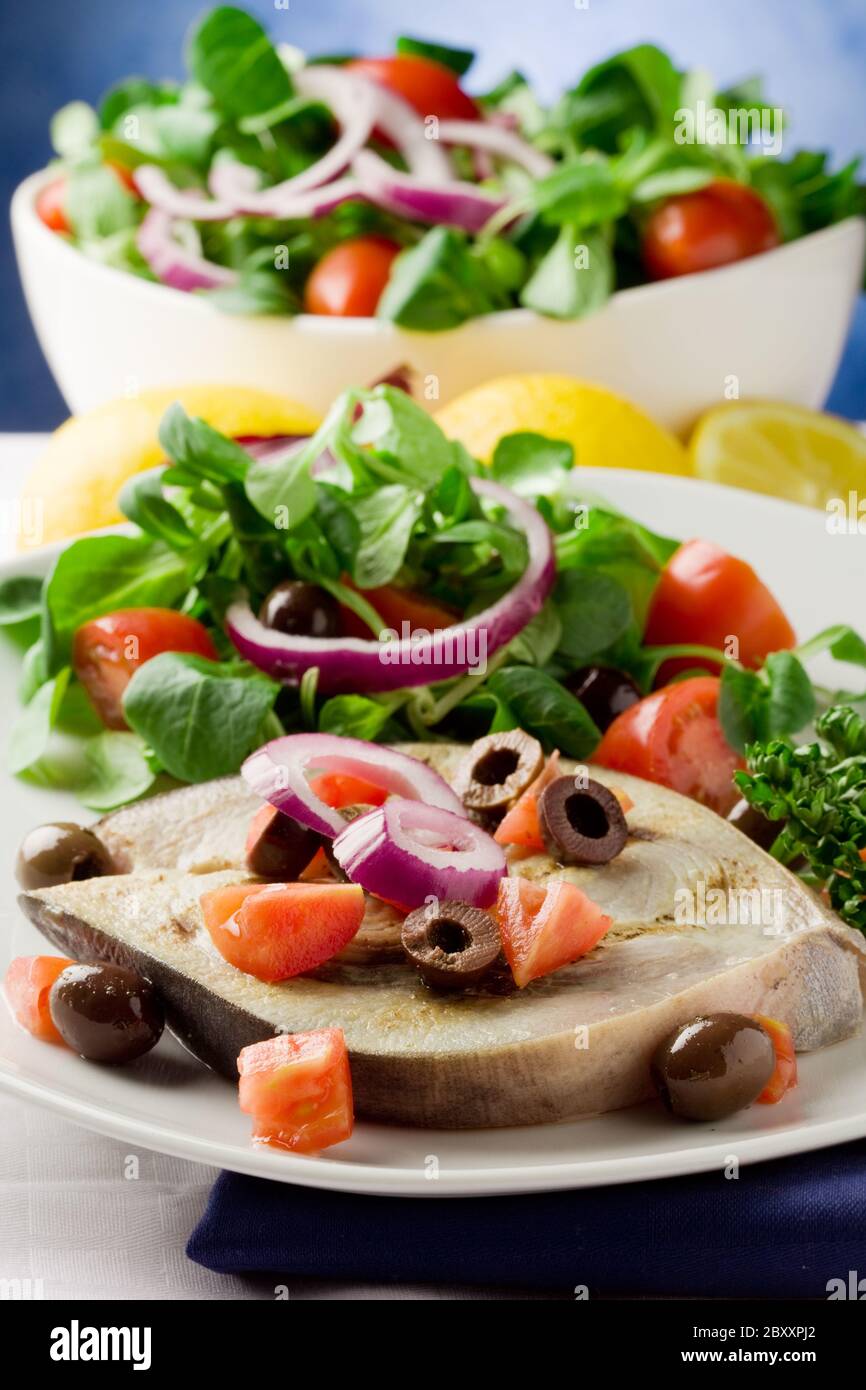 Grilled Swordfish with mixed salad Stock Photo - Alamy