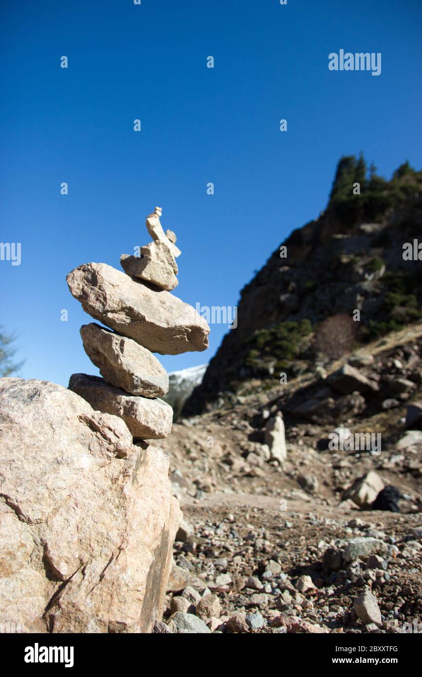 A pyramid of stones on the back of rocks. Different stones close-up ...