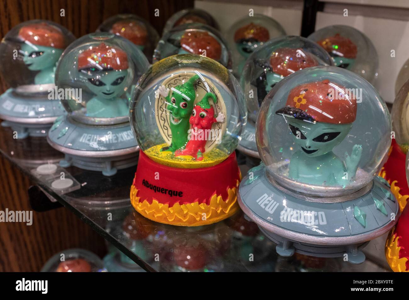 New Mexico souvenir snow globes (aliens & chile peppers Stock Photo - Alamy