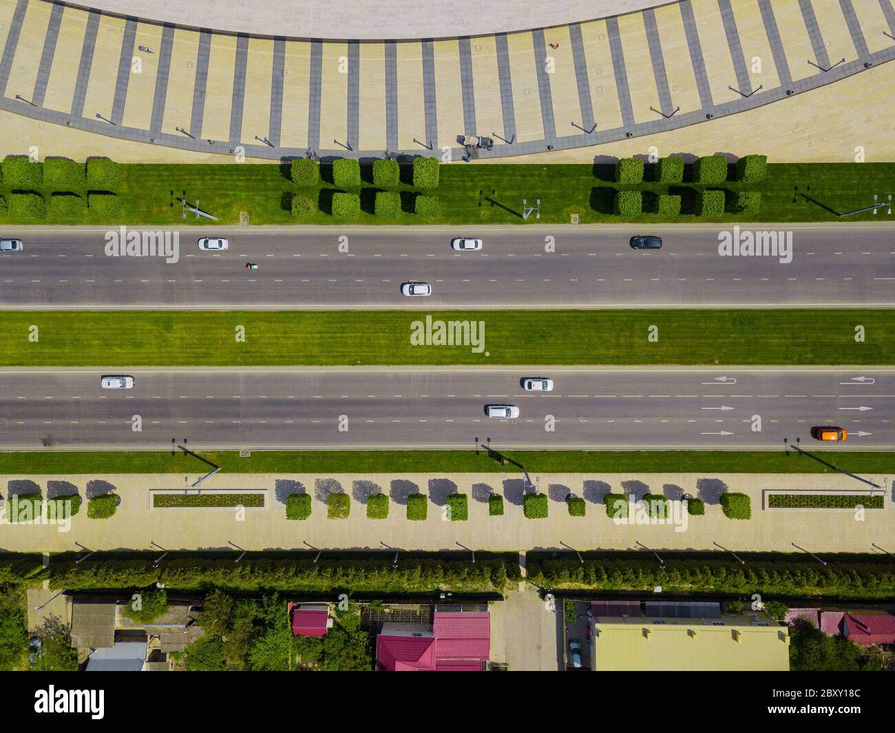 Aerial view of the vehicular intersection, city traffic with cars on ...