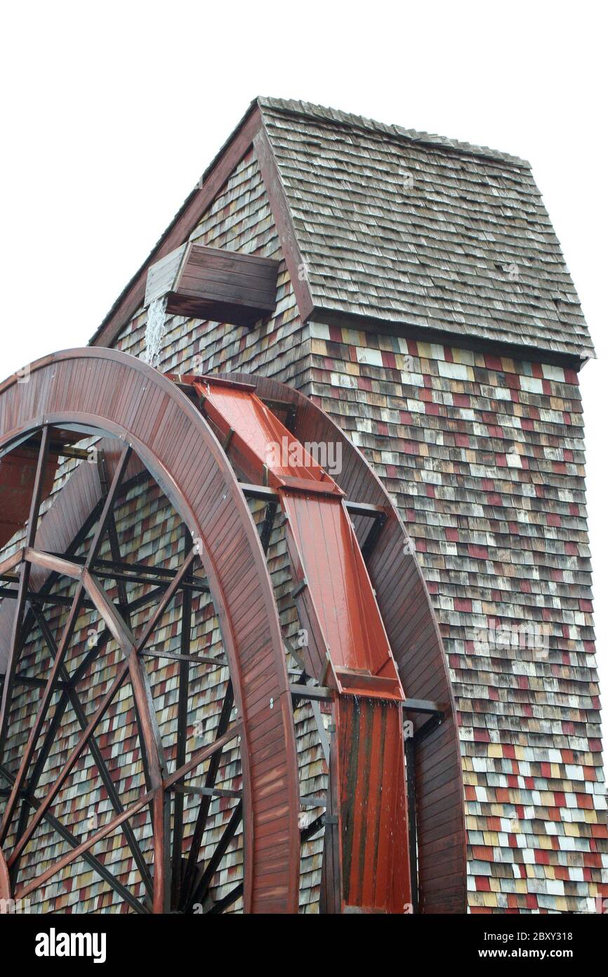Isolated Giant water wheel for a old mill Stock Photo - Alamy