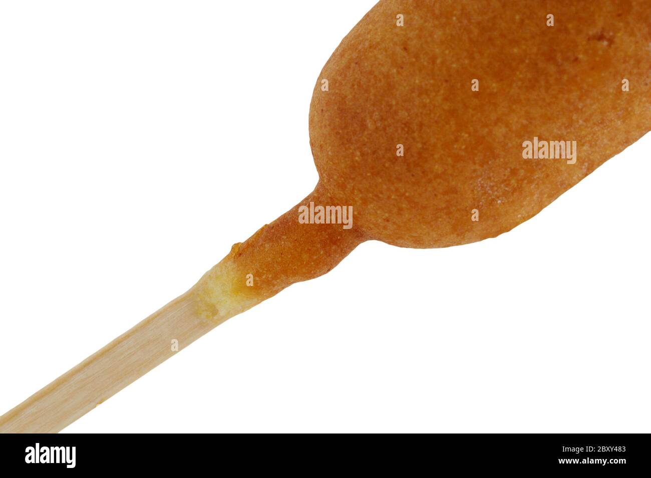 Close up of a Isolated corn dog on a stick Stock Photo - Alamy
