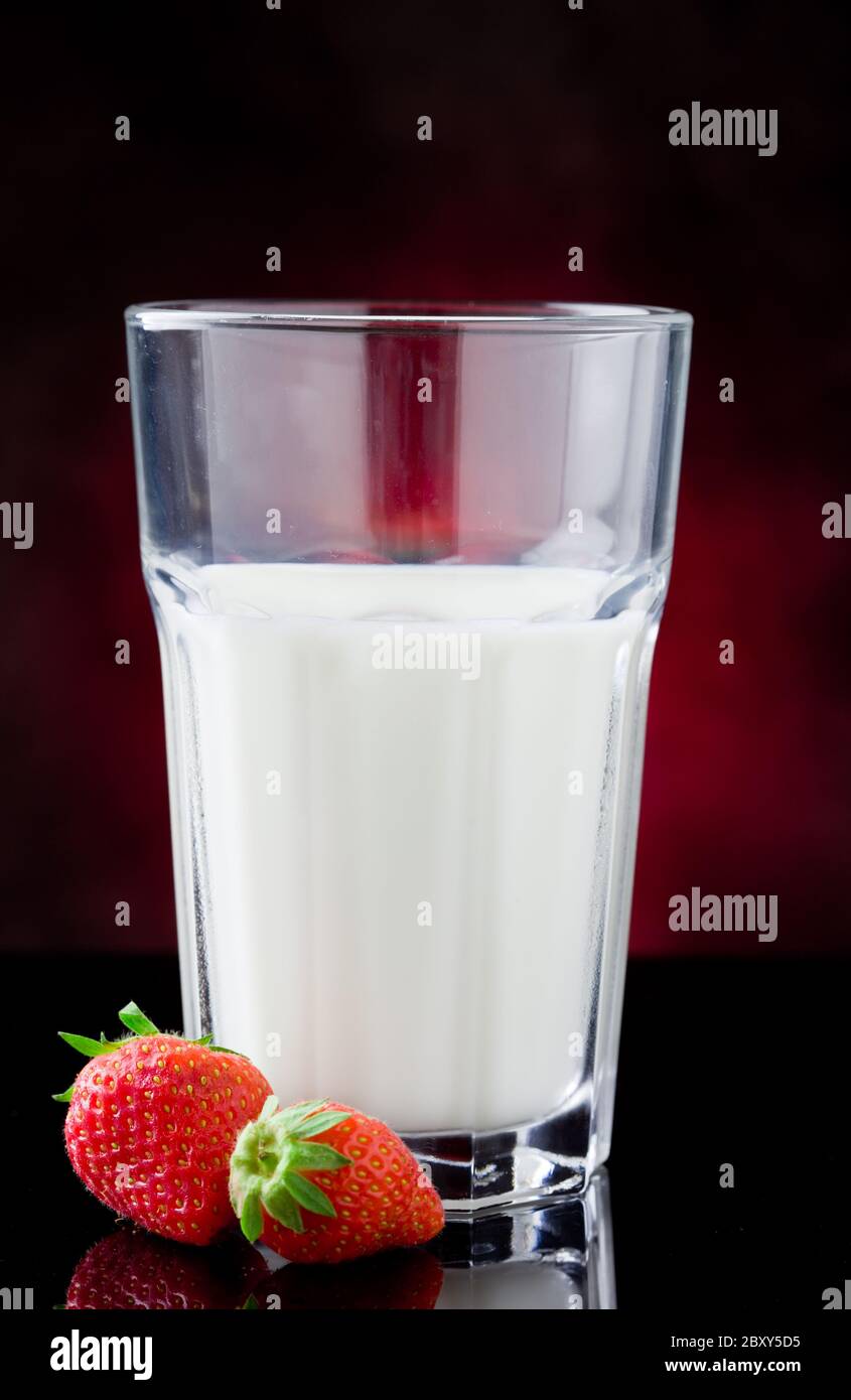 Milk and berries Stock Photo - Alamy