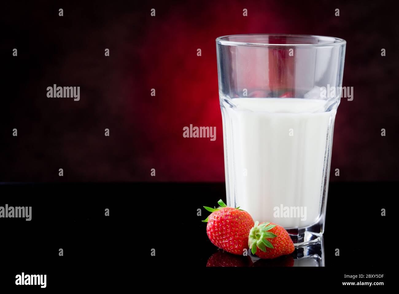 Milk and berries Stock Photo - Alamy