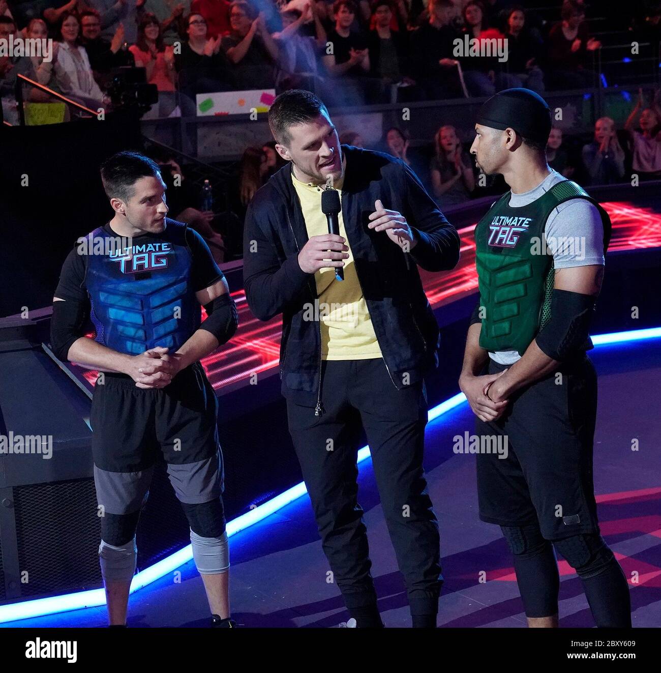 ULTIMATE TAG, host TJ Watt (center) with contestants, Girls Just Wanna ...