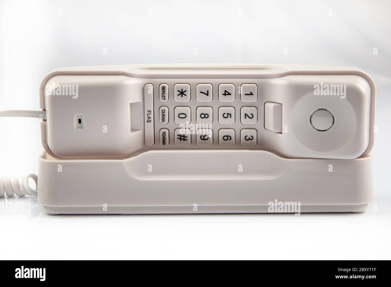 Wall Phone Desk Wall Mountable. Modern white wall phone isolated on ...
