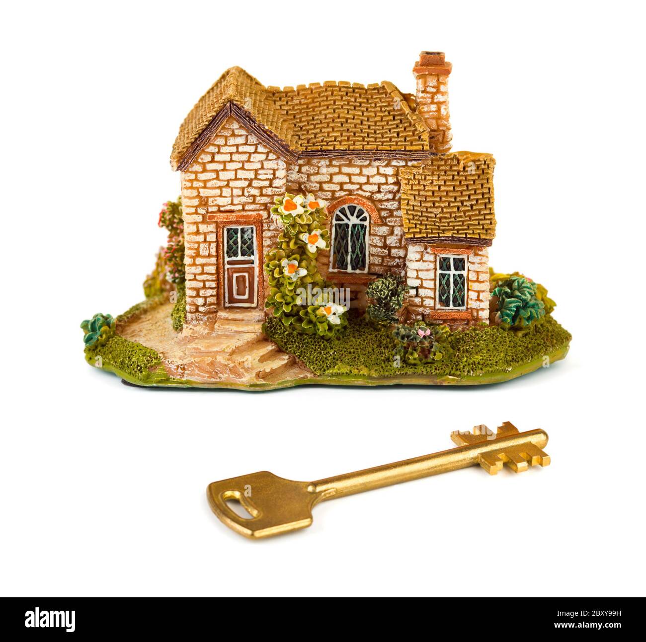 Toy house and key Stock Photo - Alamy