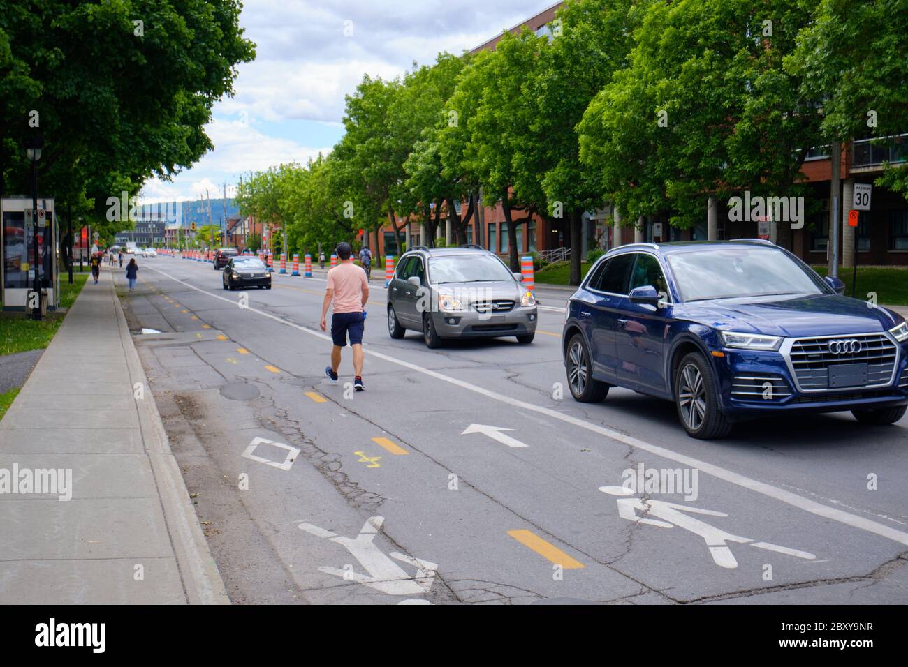 Pedestrian using large section of Rachel street in Montreal, which has ...