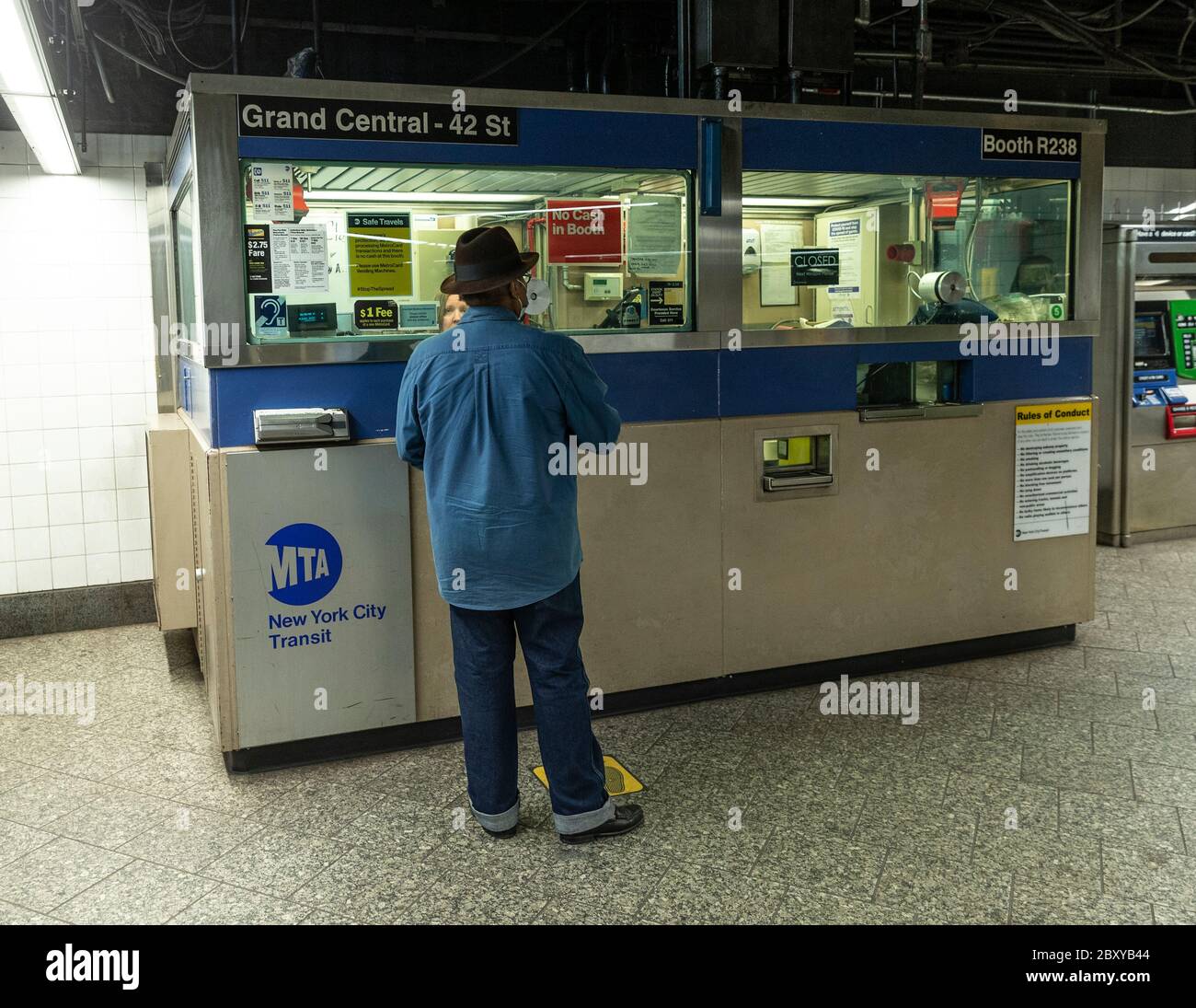 New York, NY - June 8, 2020: Commuter buying subway ride from opened ...