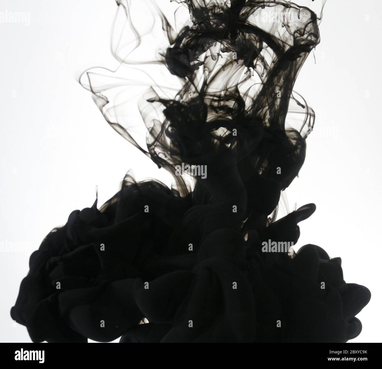 Smoke liquid ink in water Stock Photo - Alamy