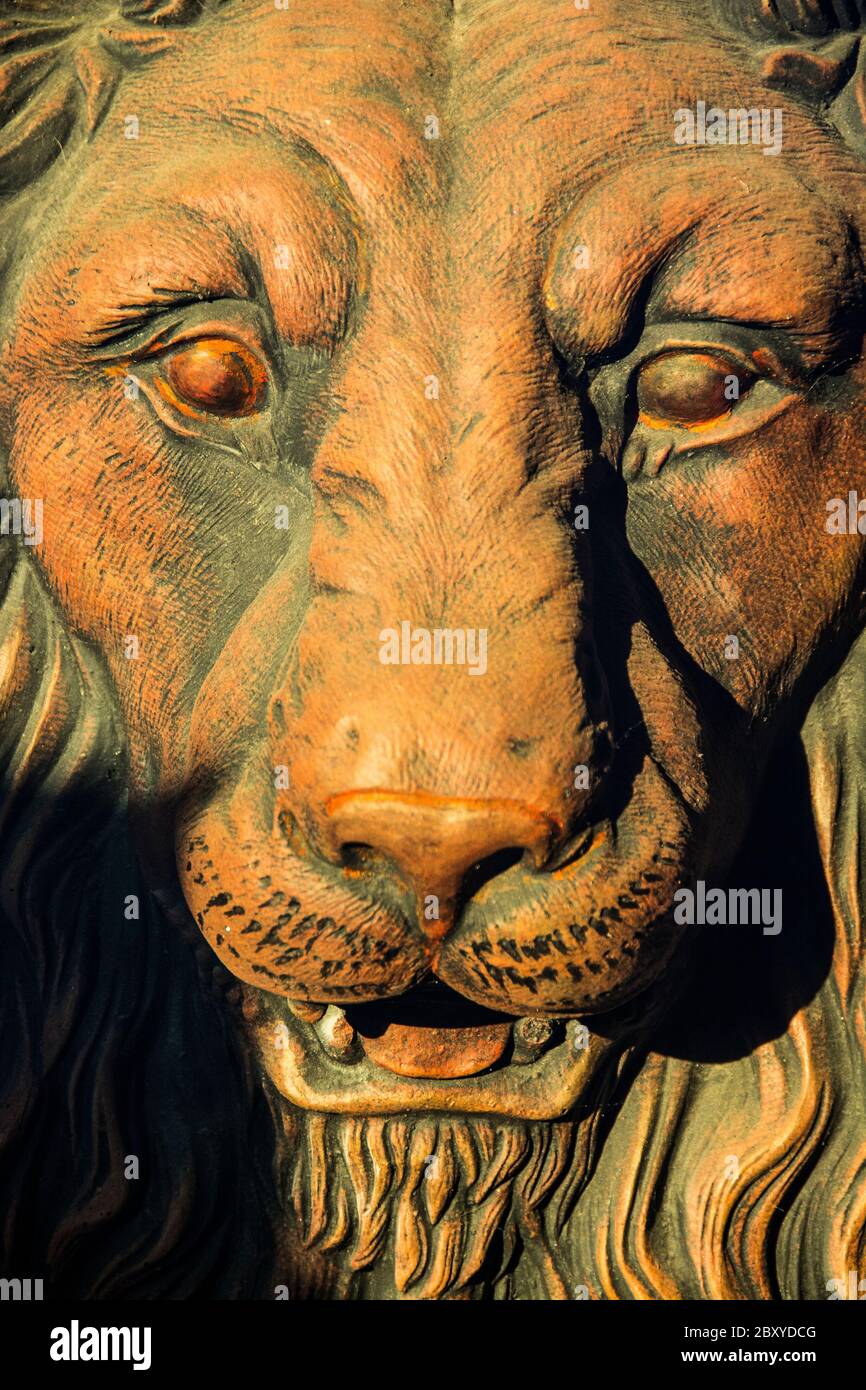 A close up image of the face of a lion statue Stock Photo - Alamy