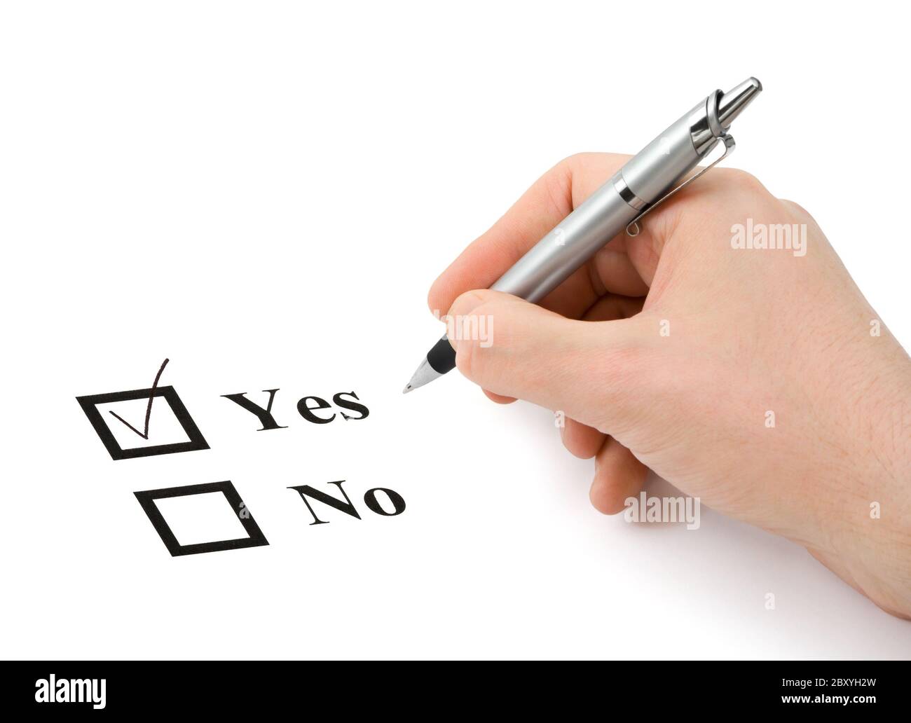 Hand with pen and check boxes Stock Photo - Alamy