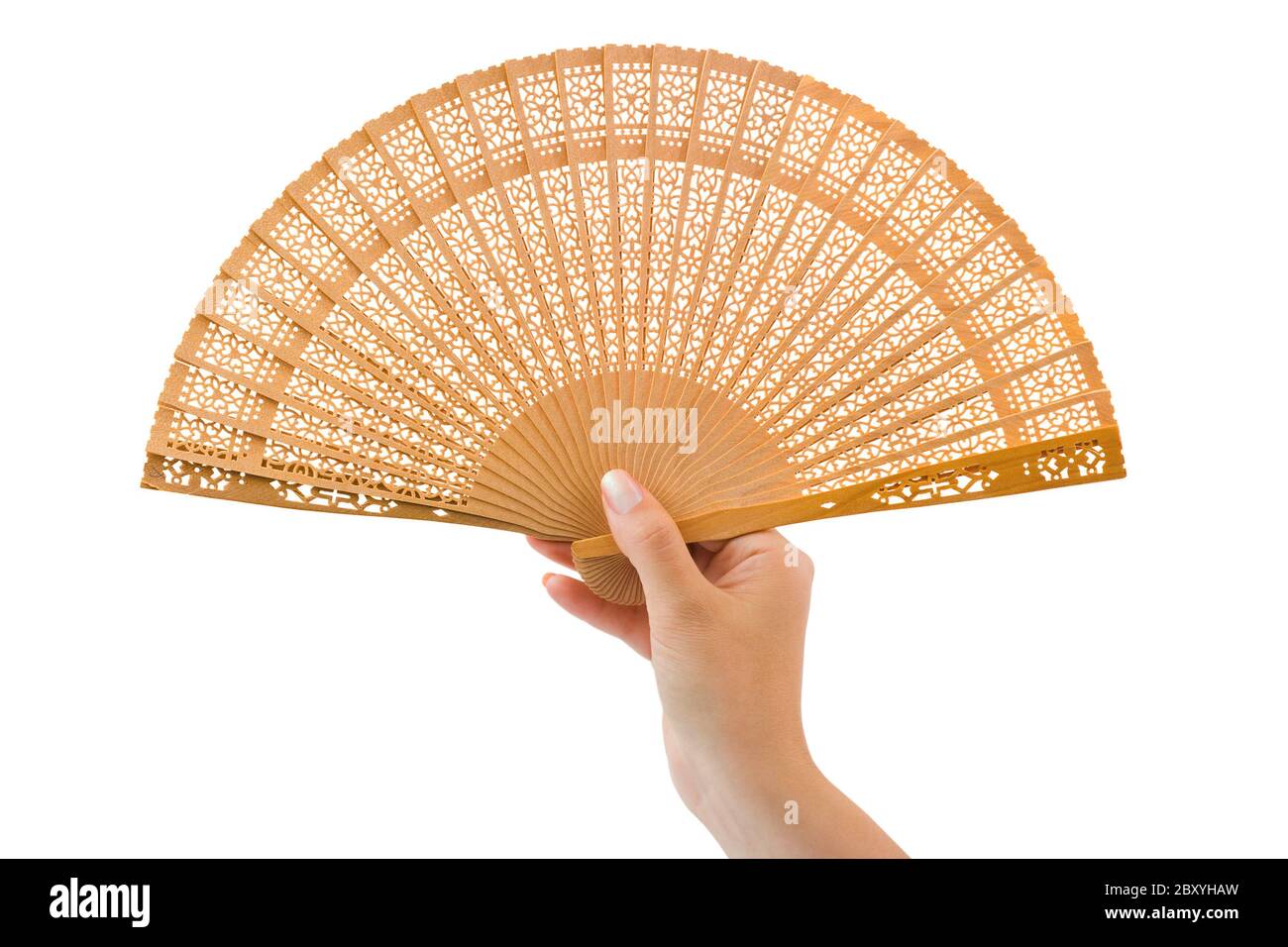 Wood fan in woman hand Stock Photo - Alamy