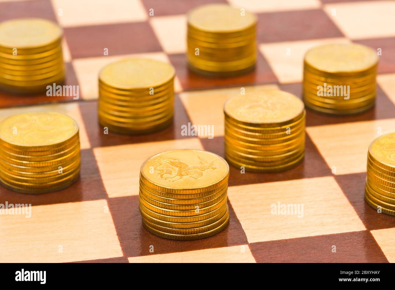 Money on chess board Stock Photo - Alamy
