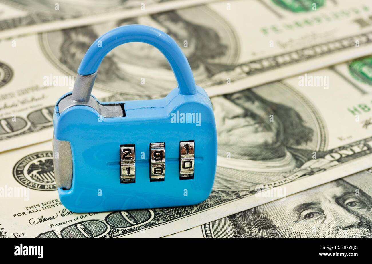 Money and lock Stock Photo - Alamy