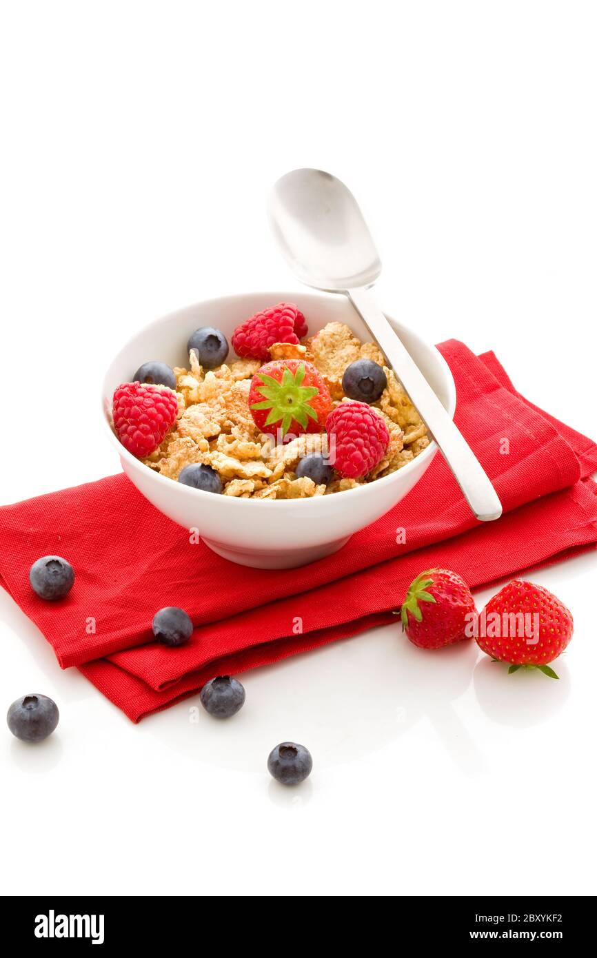 Corn flakes with berries - Isolated Stock Photo - Alamy