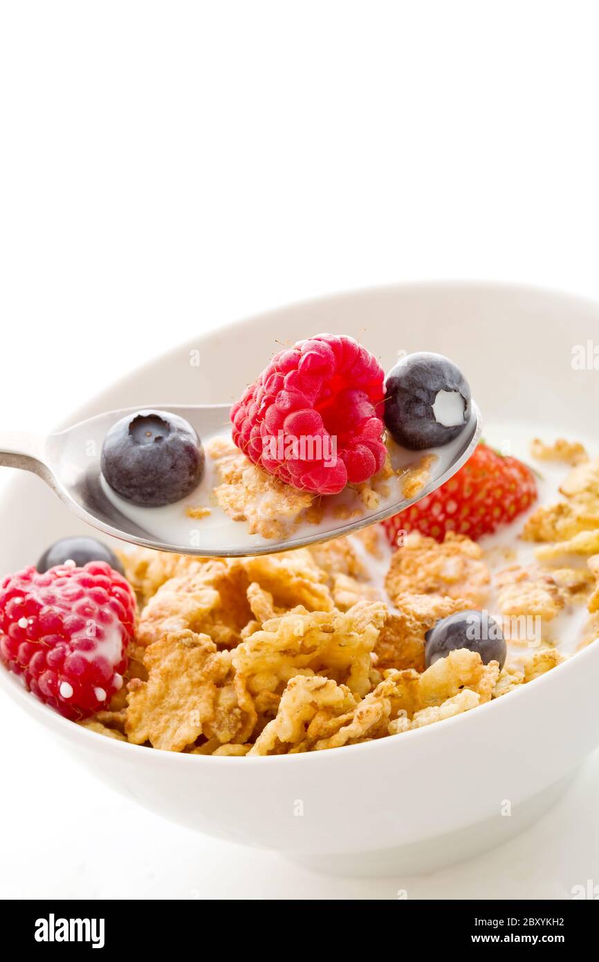 Corn flakes with berries - Isolated Stock Photo - Alamy