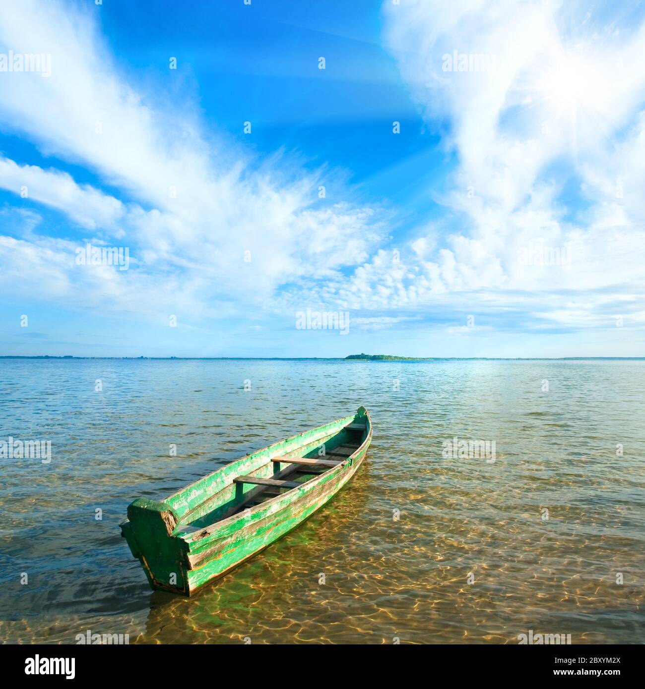 boat on summer lake bank Stock Photo - Alamy