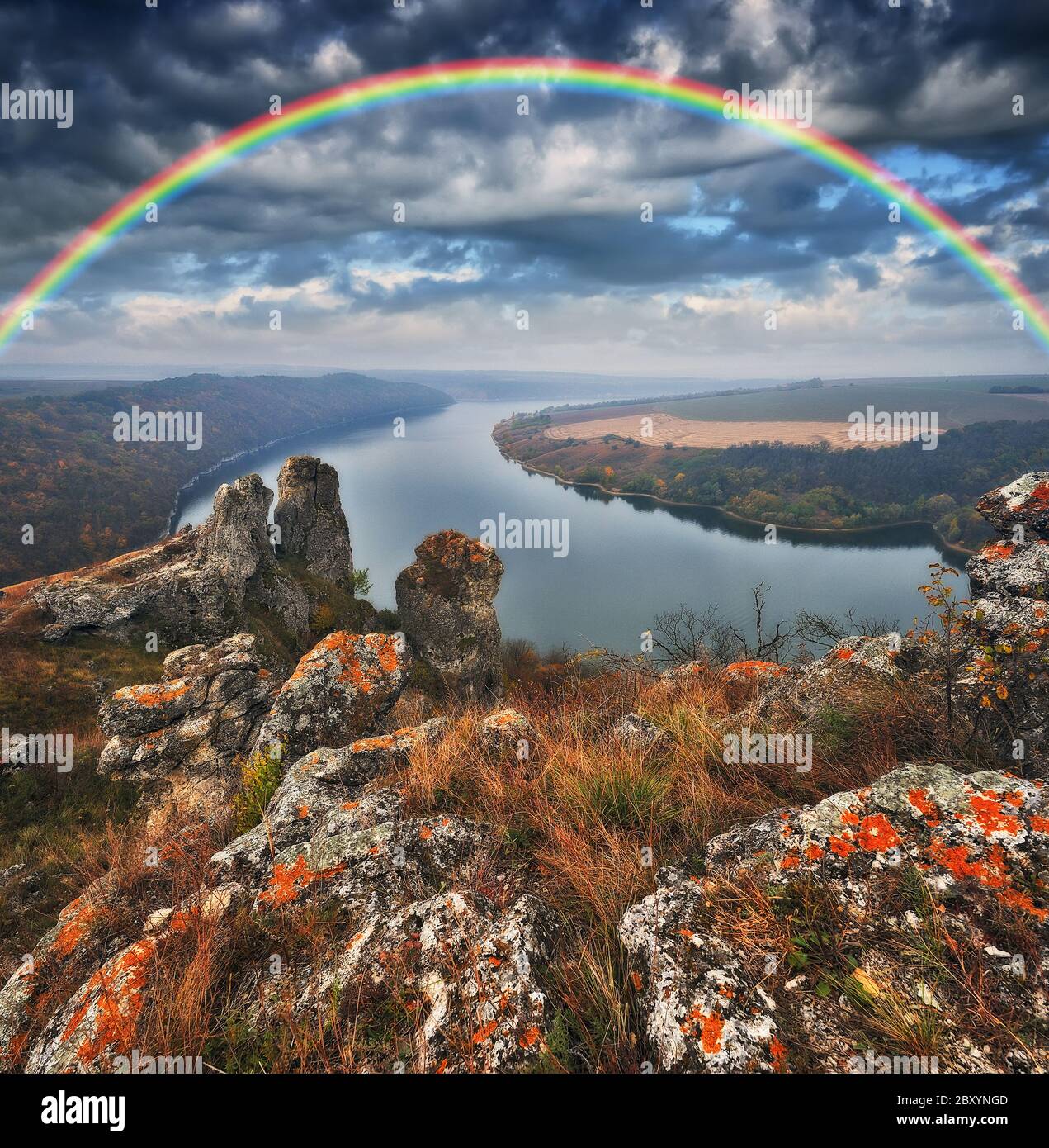colorful rainbow over river canyon Stock Photo - Alamy