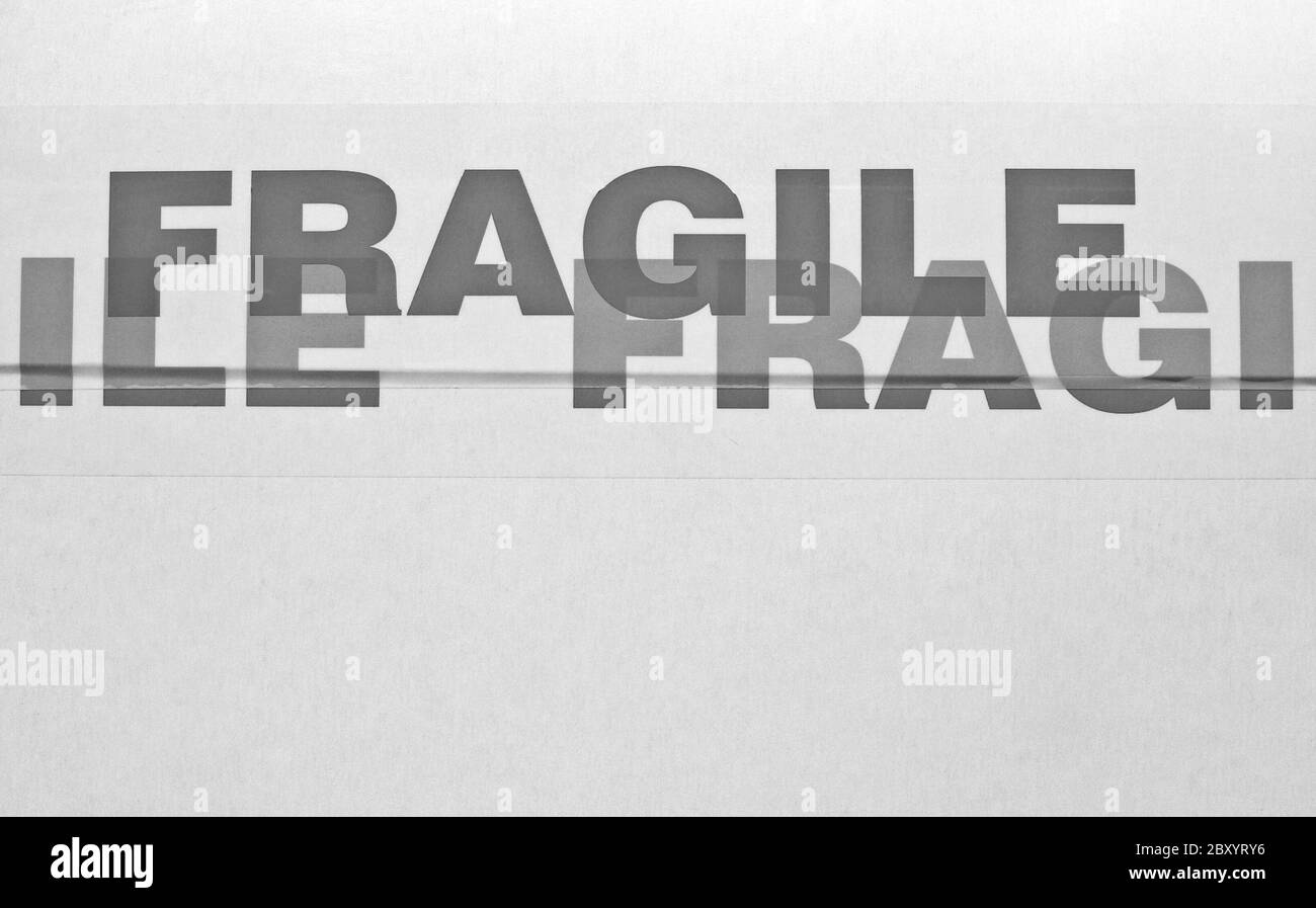 Fragile postage Black and White Stock Photos & Images - Alamy