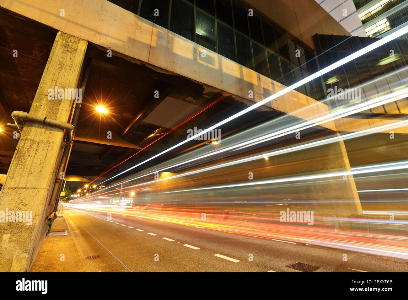 light trails in city at night Stock Photo - Alamy