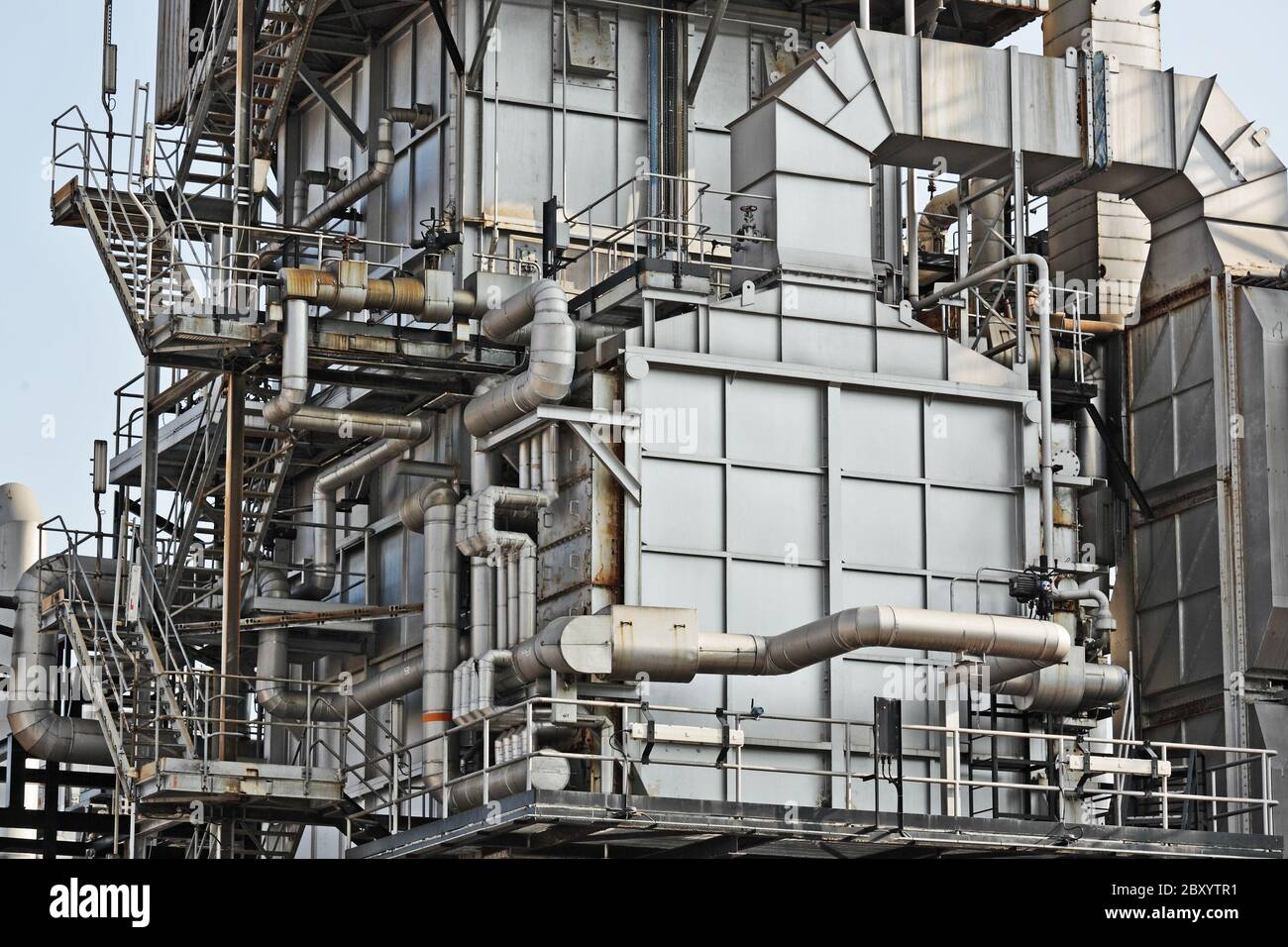 Industrial building, Steel pipelines Stock Photo - Alamy