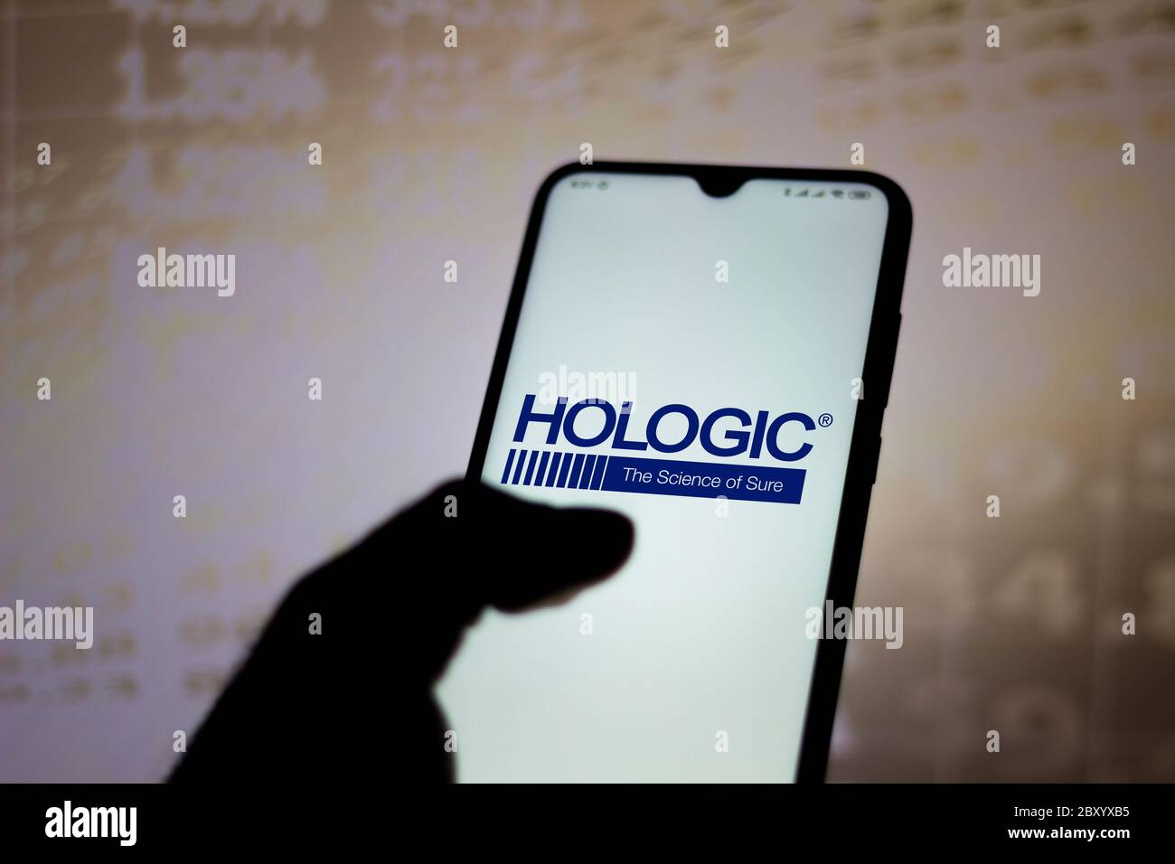 In this photo illustration a Hologic logo seen displayed on a ...