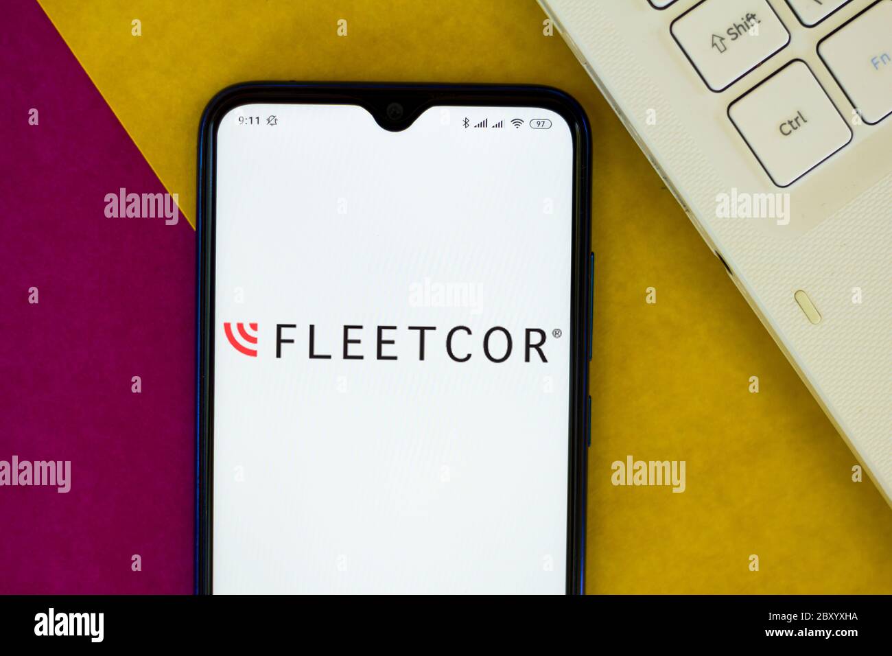 In this photo illustration the FleetCor Technologies logo seen ...