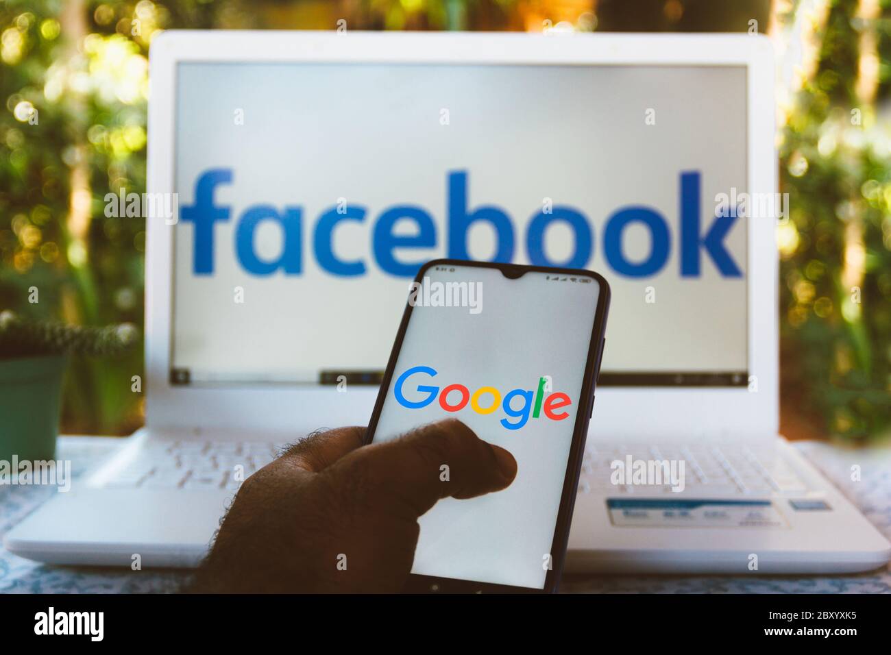In this photo illustration the Google logo is displayed on a smartphone ...