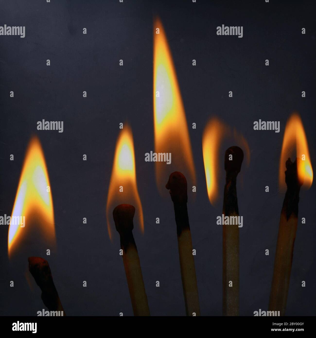 five burning matches Stock Photo - Alamy