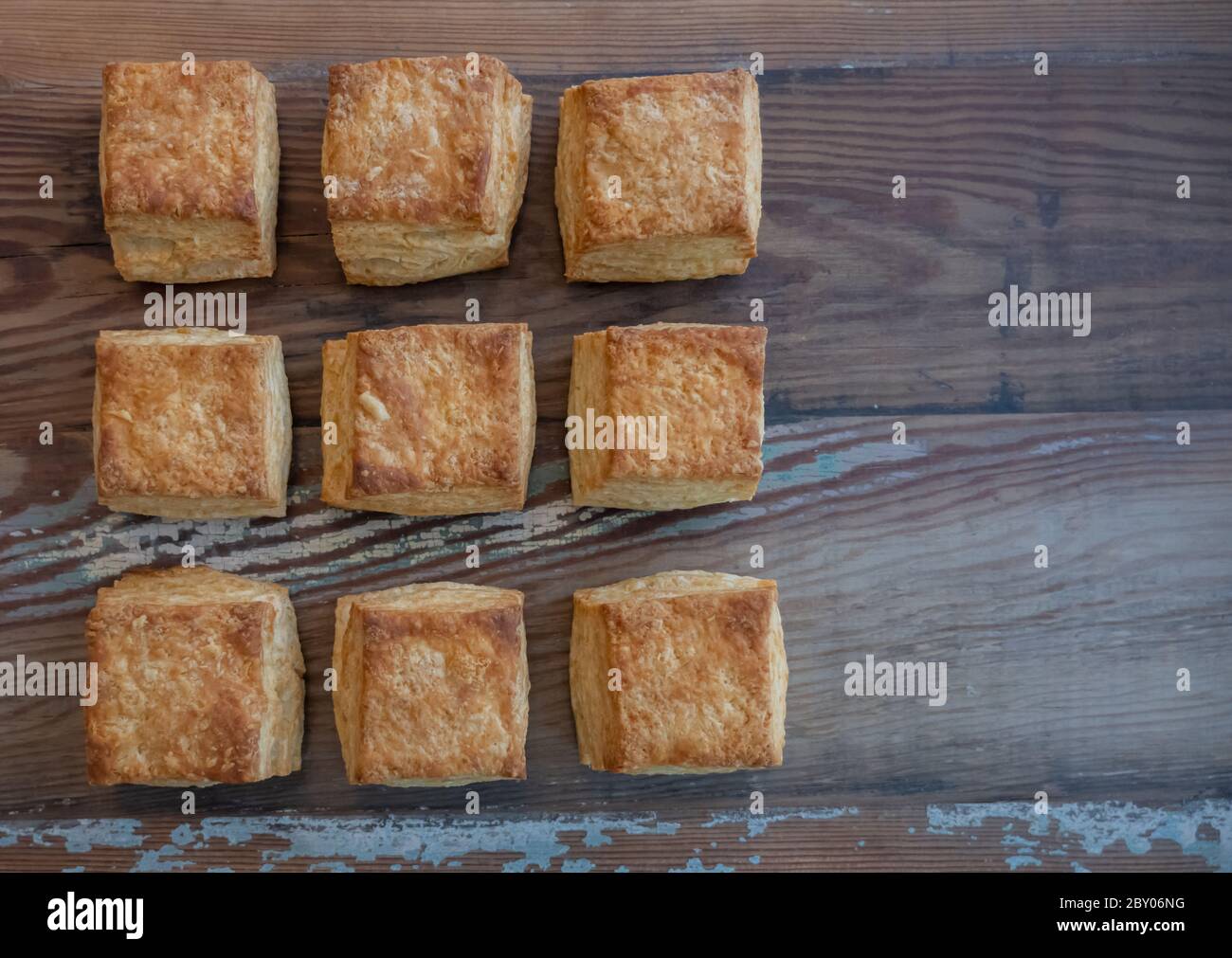 Nine Square Biscuits With Copy Space to right Stock Photo - Alamy