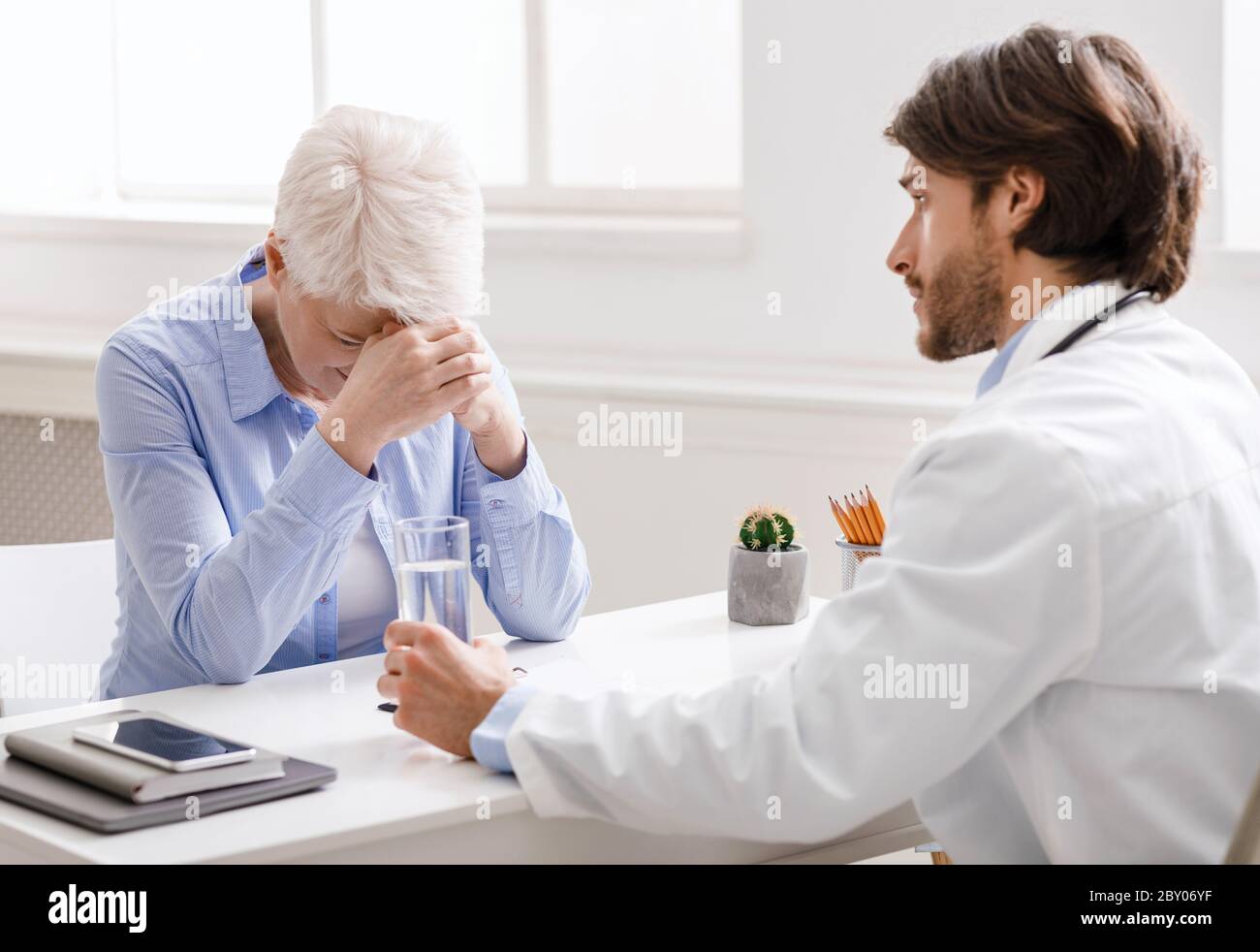 Desperate senior woman getting test results at appointment Stock Photo ...