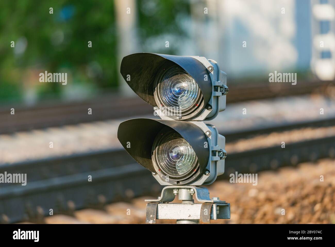 Railway track and traffic light by the railway junction Stock Photo - Alamy