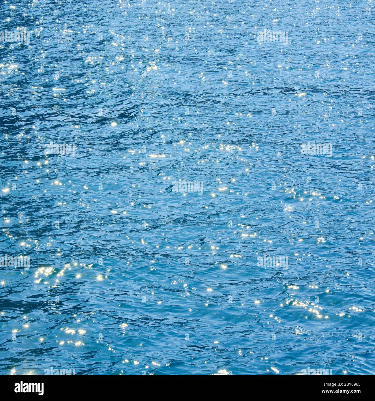 Azure sea water surface Stock Photo - Alamy