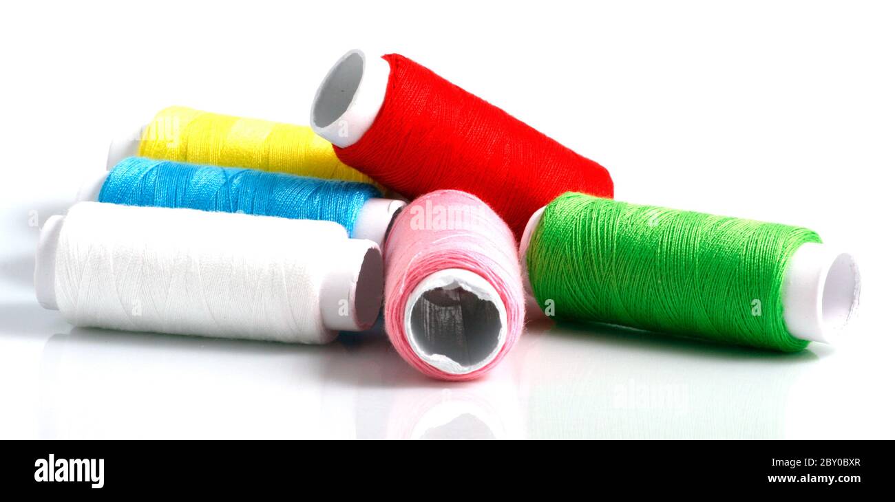 Set of colorful spools of thread Stock Photo - Alamy