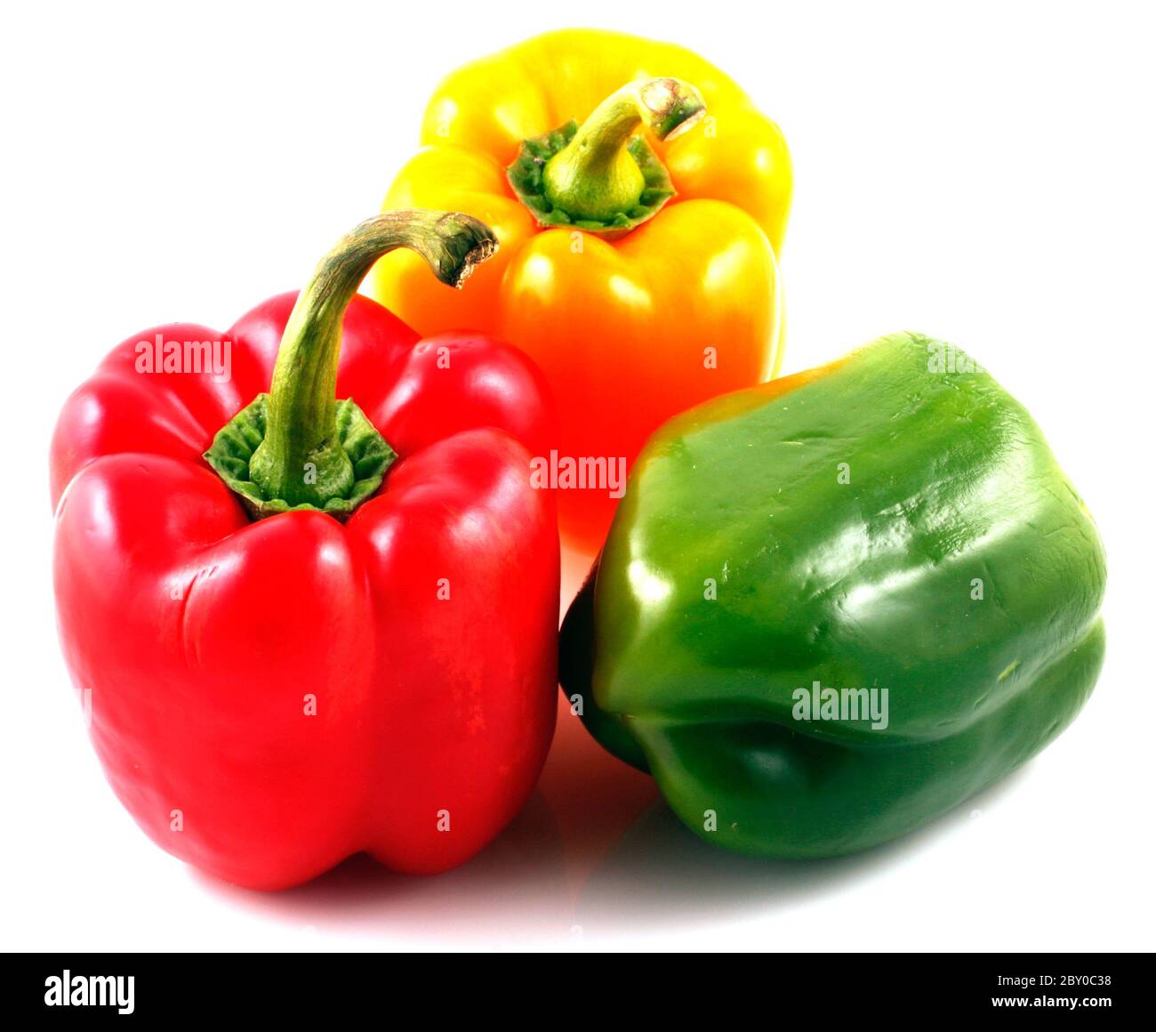 Peppers on white background Stock Photo - Alamy