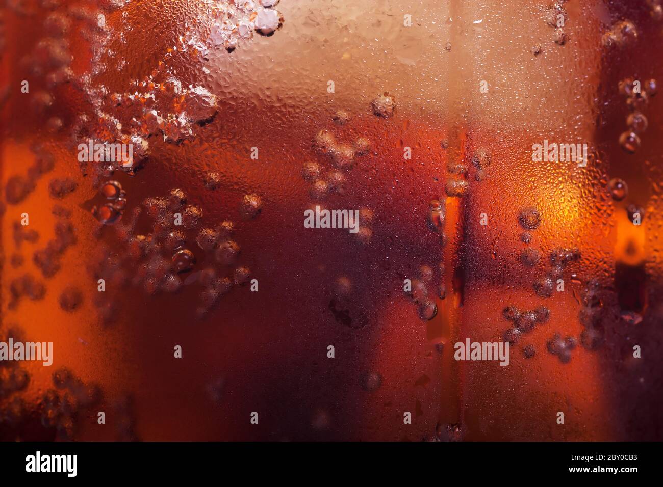 Cold cola with ice Stock Photo - Alamy