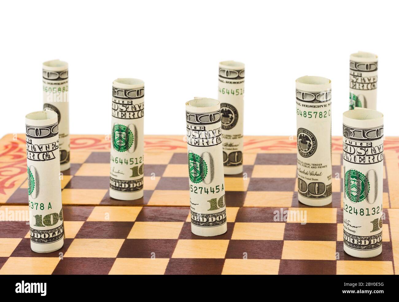 Money on chess board Stock Photo - Alamy
