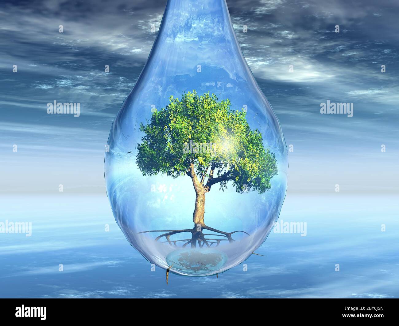 tree in a drop Stock Photo - Alamy