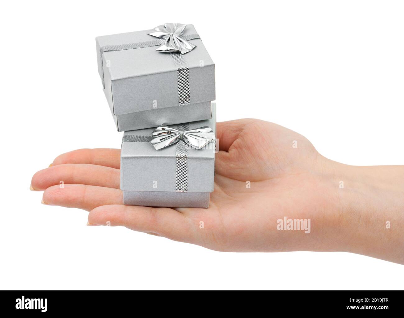 Hand and gifts Stock Photo - Alamy