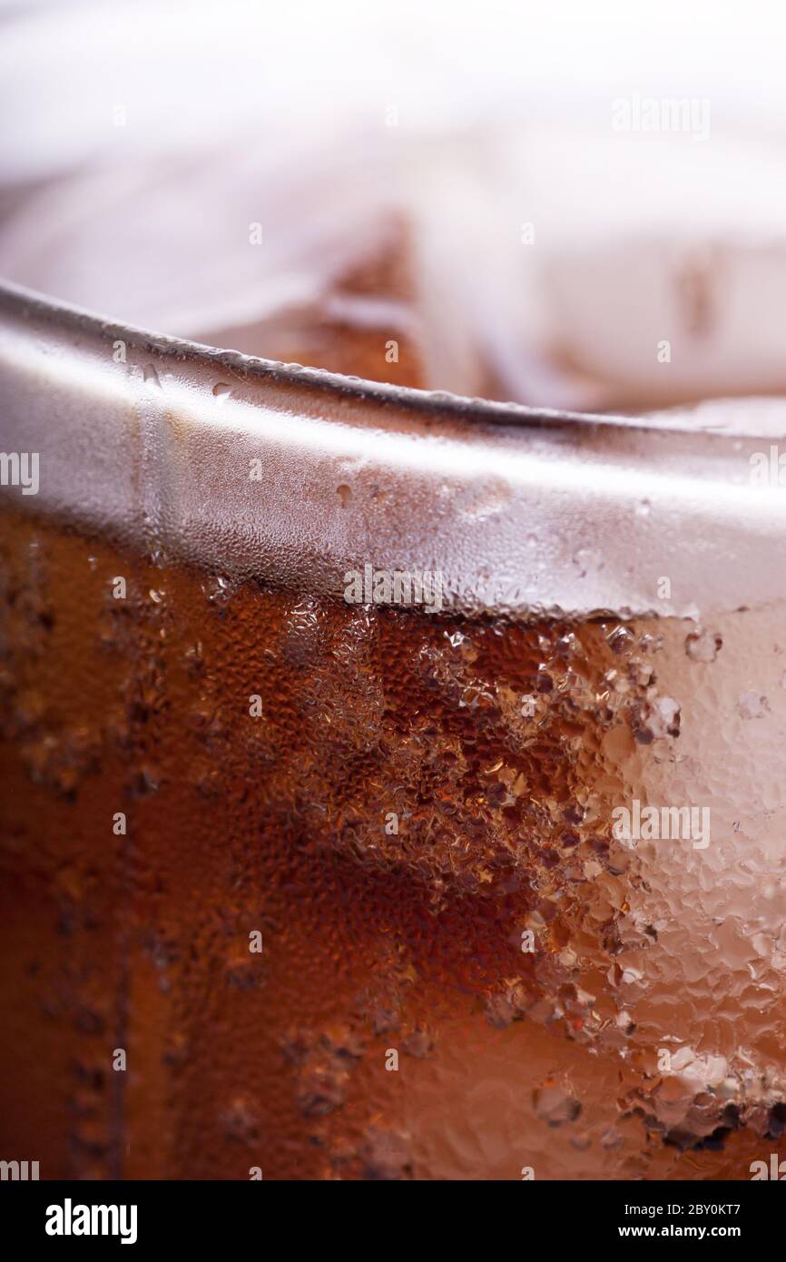 Cold cola with ice Stock Photo - Alamy