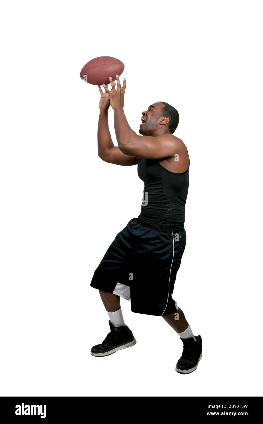 Black Man Playing Football Stock Photo - Alamy