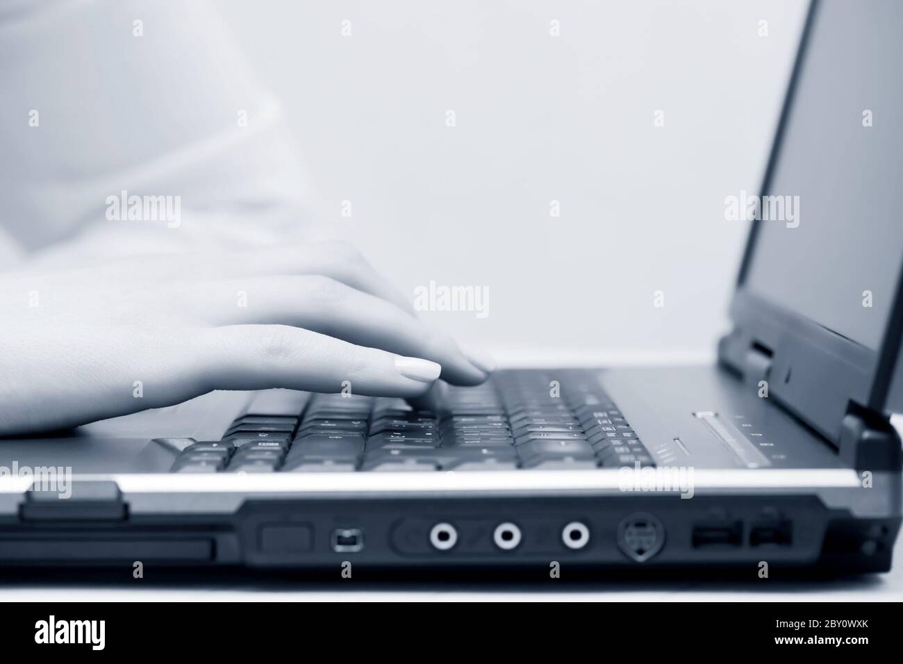 Woman typing on laptop using hi-res stock photography and images - Alamy