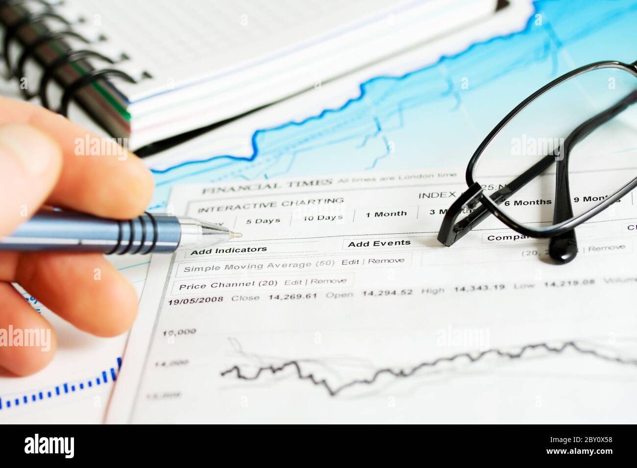 Stock market reports analysis Stock Photo - Alamy