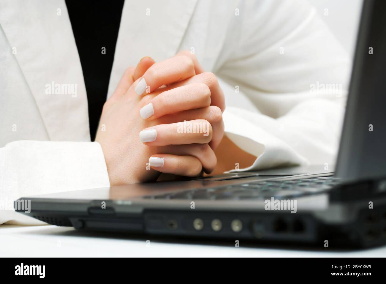 Female hands on the laptop Stock Photo - Alamy