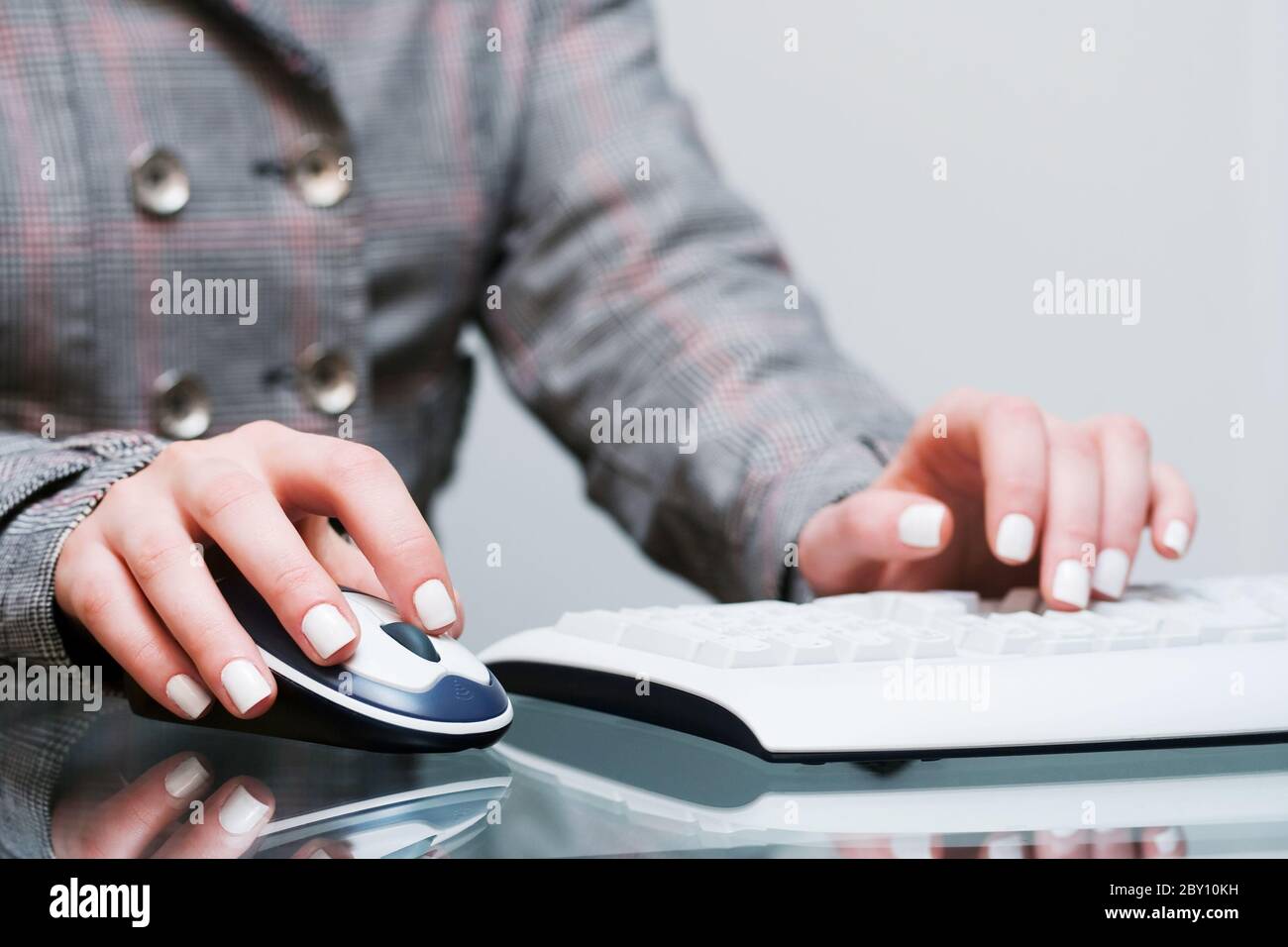 Female hands working on computer Stock Photo - Alamy