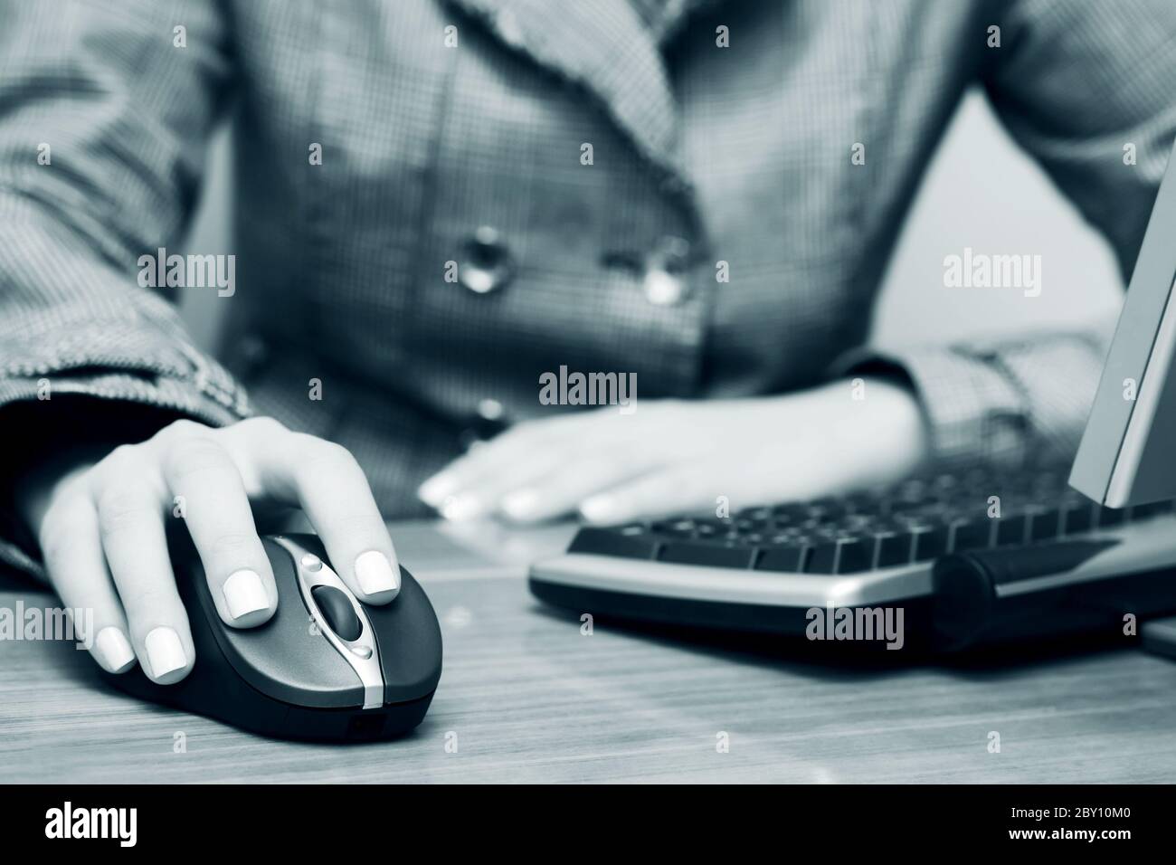 Female hands using computer Stock Photo - Alamy