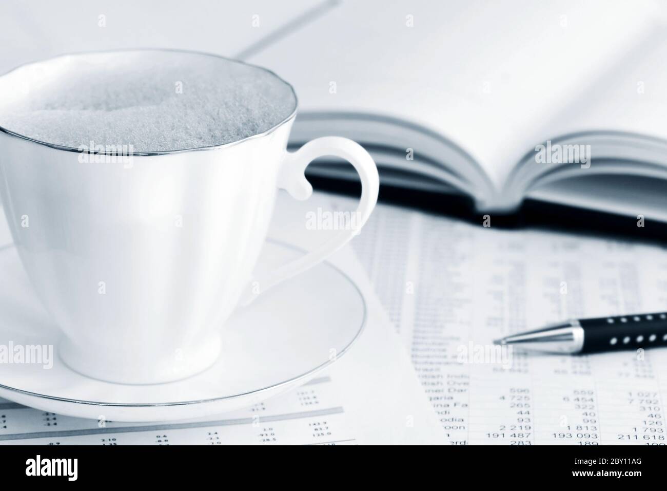 Coffee and accounting Stock Photo - Alamy