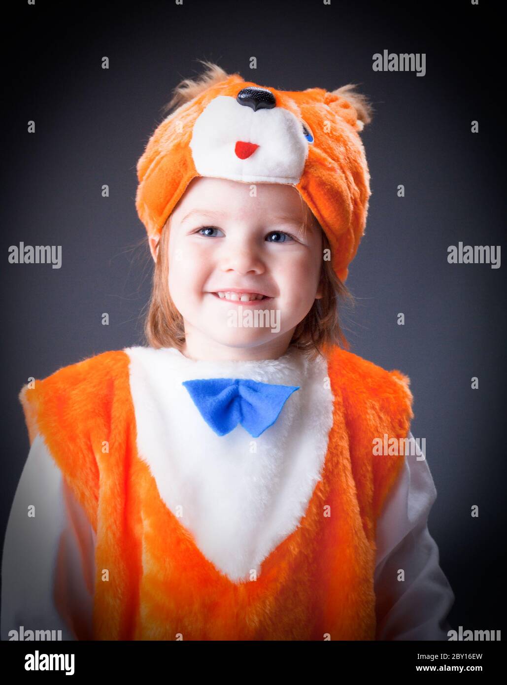 Little baby girl dressed in a fox suit Stock Photo - Alamy