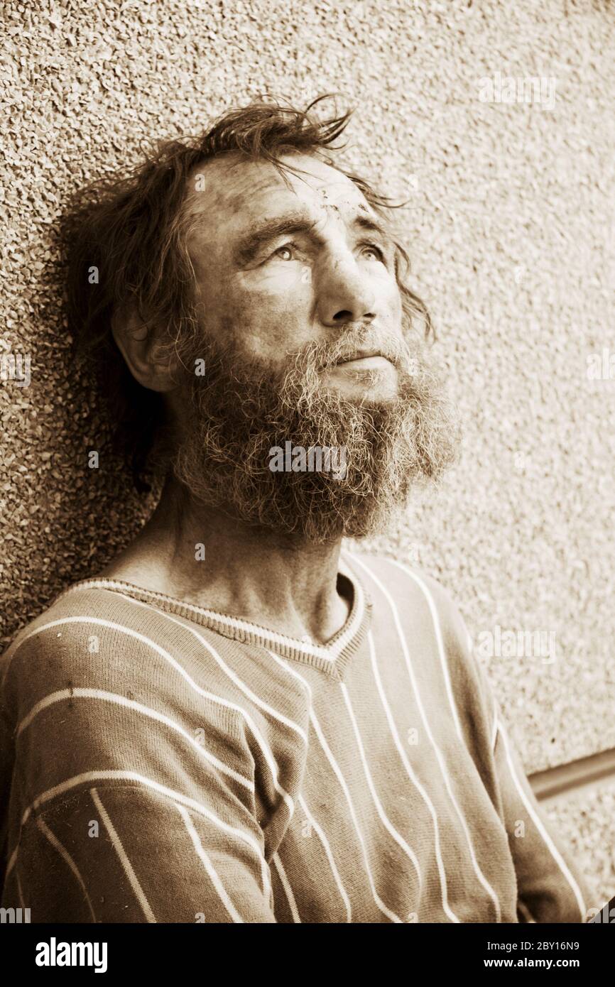 Homeless man in despair Stock Photo - Alamy
